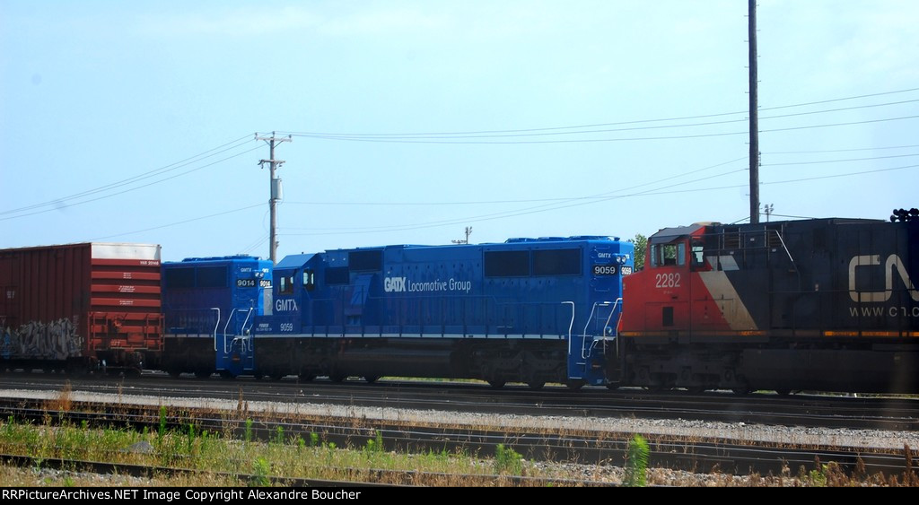 GMTX SD60 9014 and 9059 at CN Tachereau Yard, Montreal, Quebec